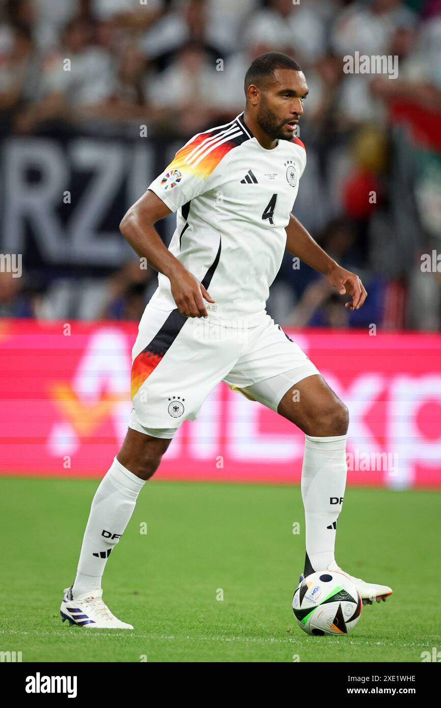 FRANKFURT AM MAIN, GERMANY - JUNE 23: Jonathan Tah of Germany runs with ...
