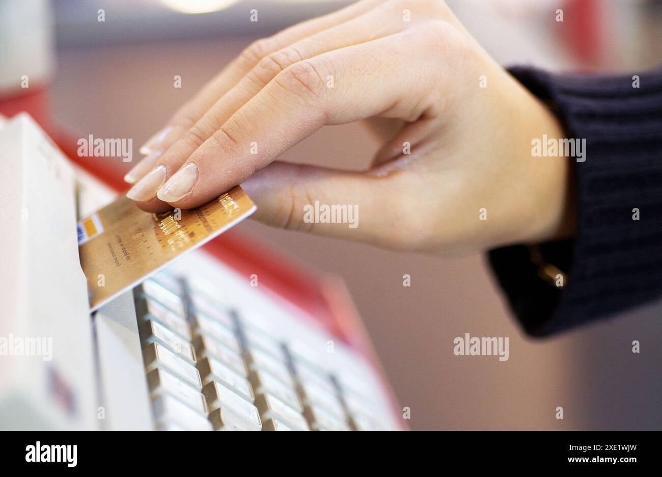 Hand in the cash register hi-res stock photography and images - Alamy