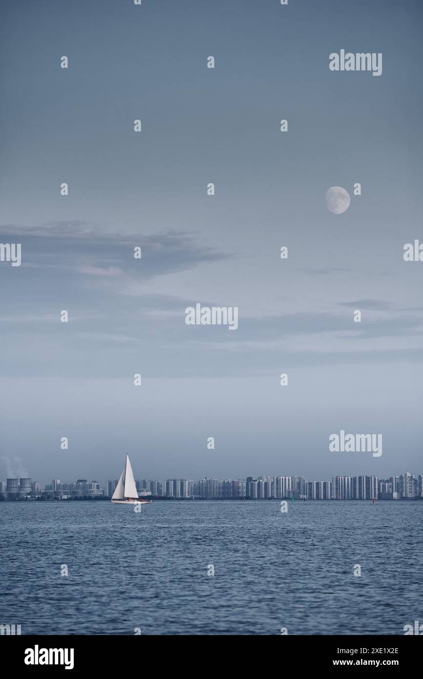 Sailboat at full moon, bow of sailing yacht, black mast, housing ...