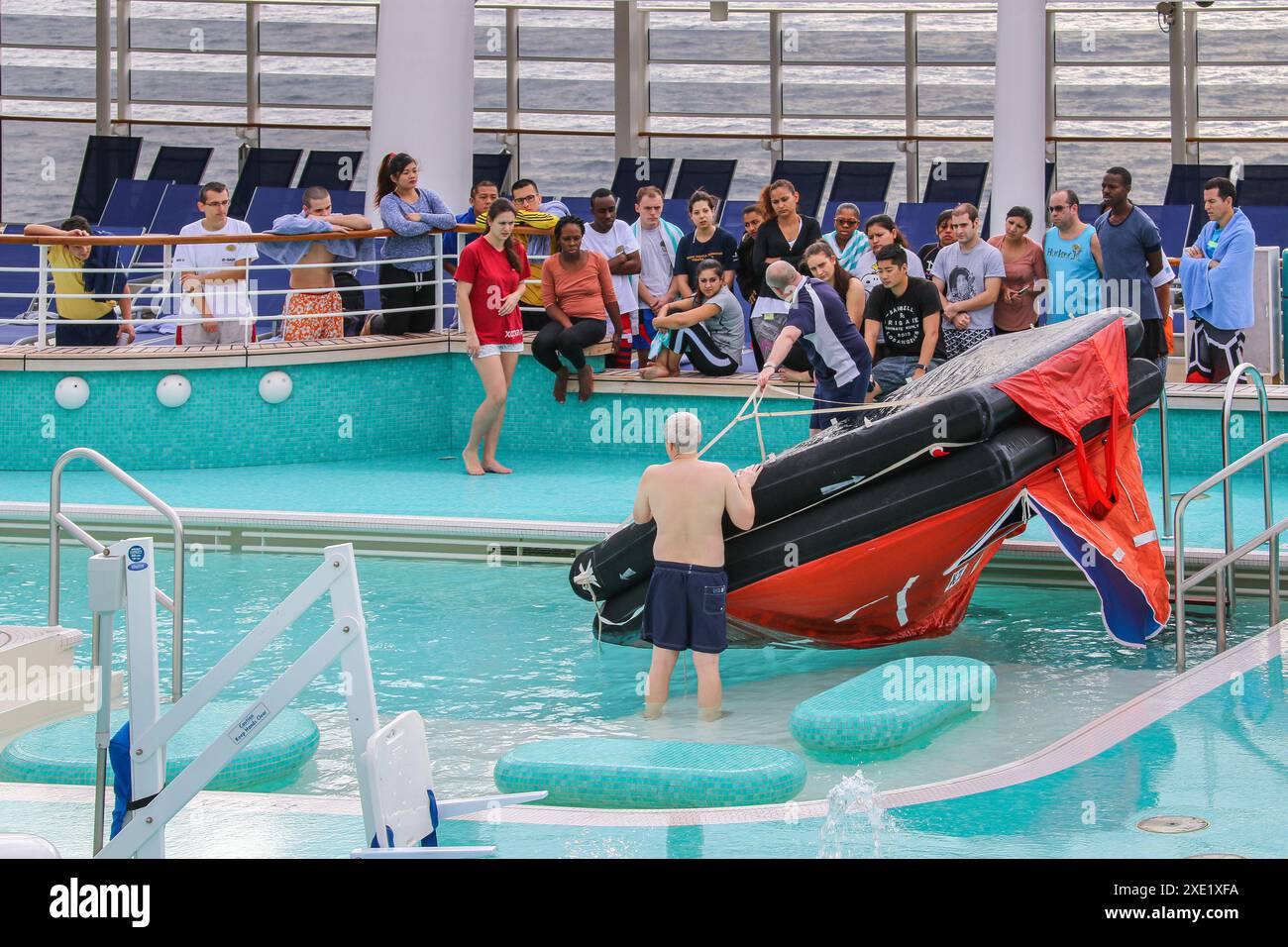 At sea. June 25, 2024: Crew members trained in a cruise ship' pool to ...