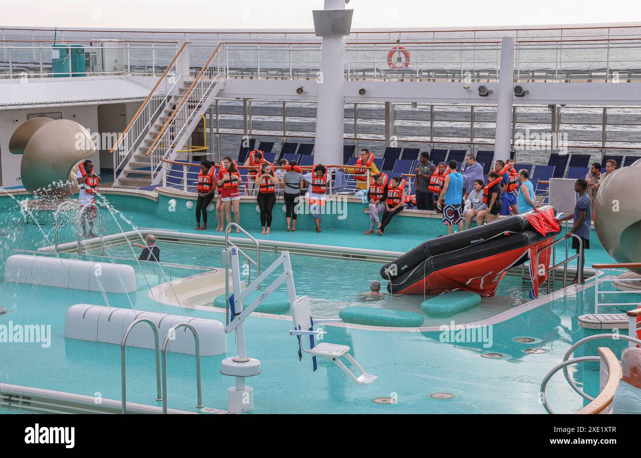 At sea. June 25, 2024: Crew members trained in a cruise ship' pool to ...