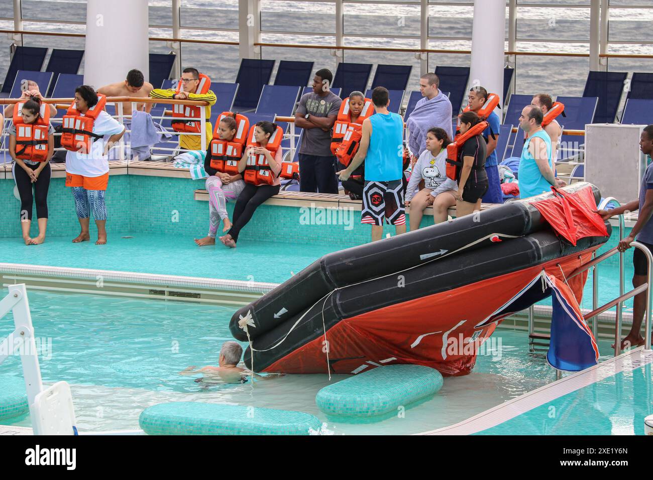 At sea. June 25, 2024: Crew members trained in a cruise ship' pool to ...