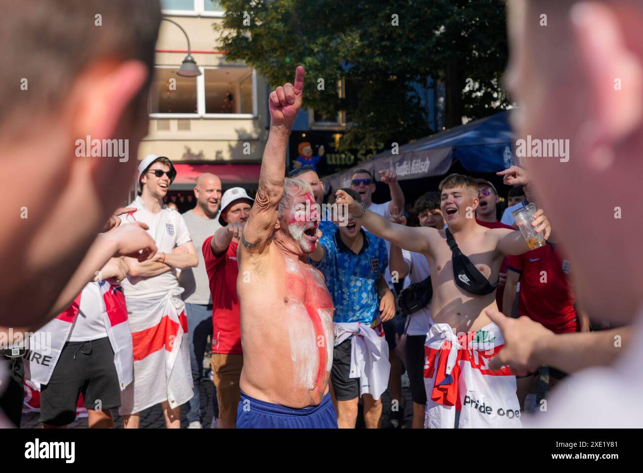 English soccer fans cheer for their team ahead of a Group C match ...