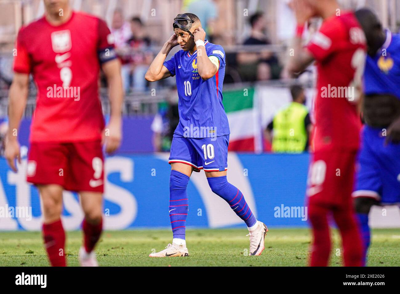 DORTMUND, GERMANY - JUNE 25: Kylian Mbappe of France takes off his mask ...
