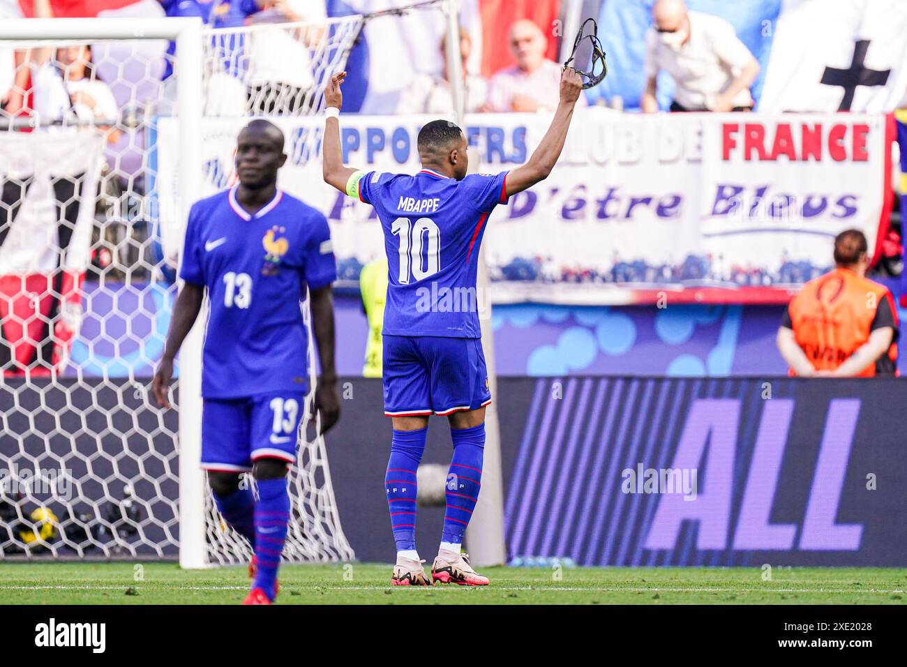 DORTMUND, GERMANY - JUNE 25: Kylian Mbappe of France takes off his mask ...