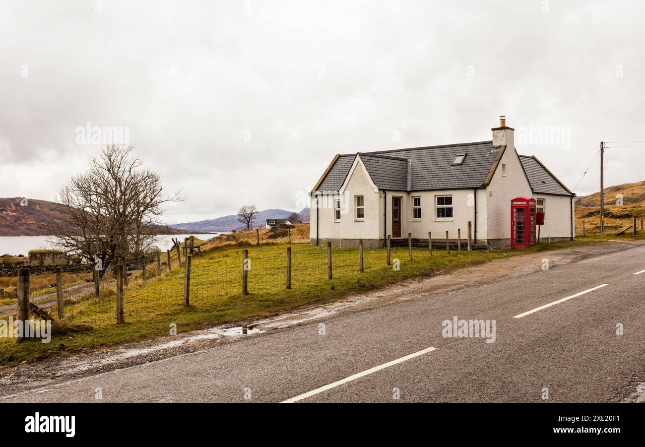 Inchnadamph (Highlands, Scotland). A house and a typical red telephone ...