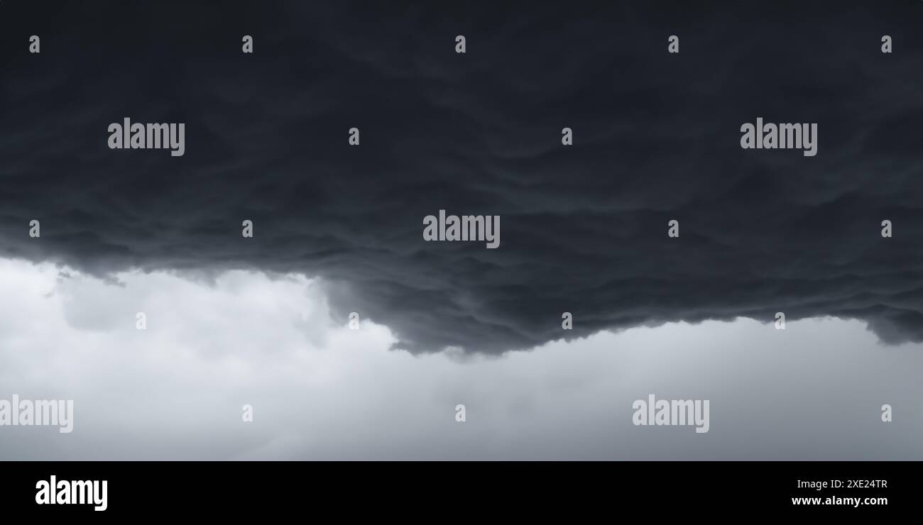 Threatening and formidable, black storm clouds amass overhead Stock ...