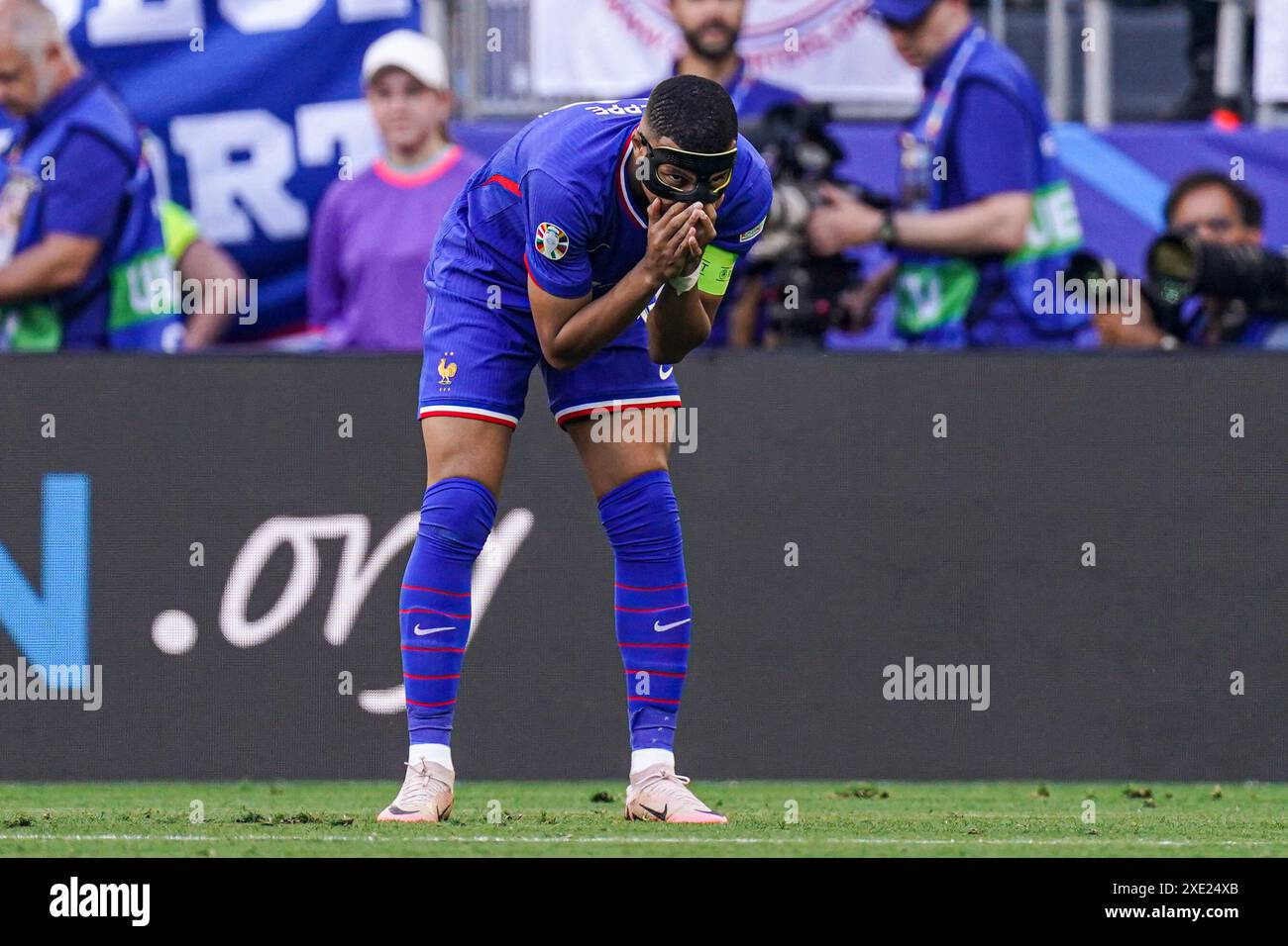 DORTMUND, GERMANY - JUNE 25: Kylian Mbappe of France with mask hurts ...