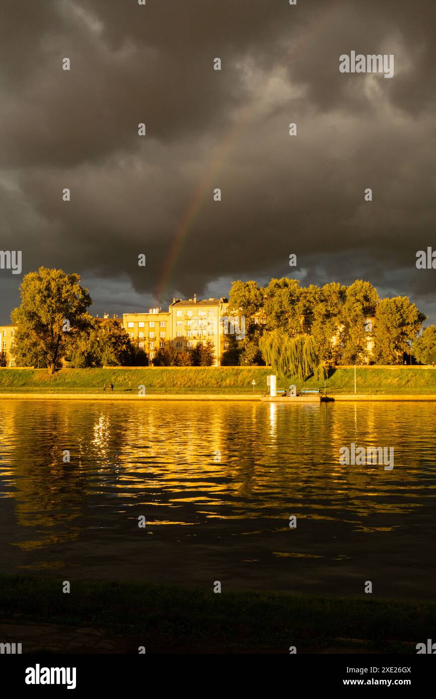 Heavy rain and rainbow above the Vistula river in Krakow Poland ...