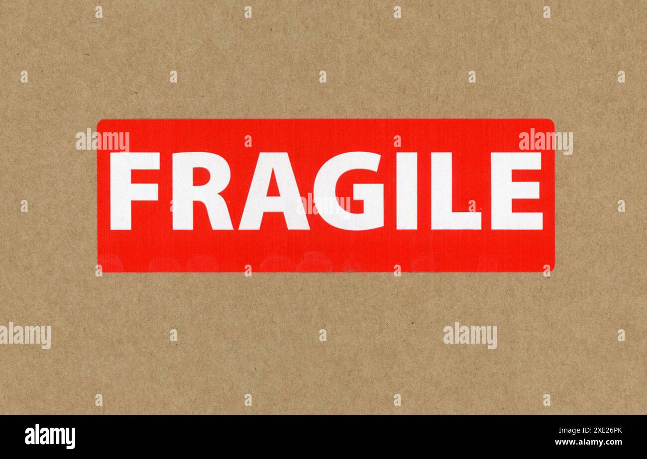 fragile label on a corrugated cardbord box Stock Photo - Alamy