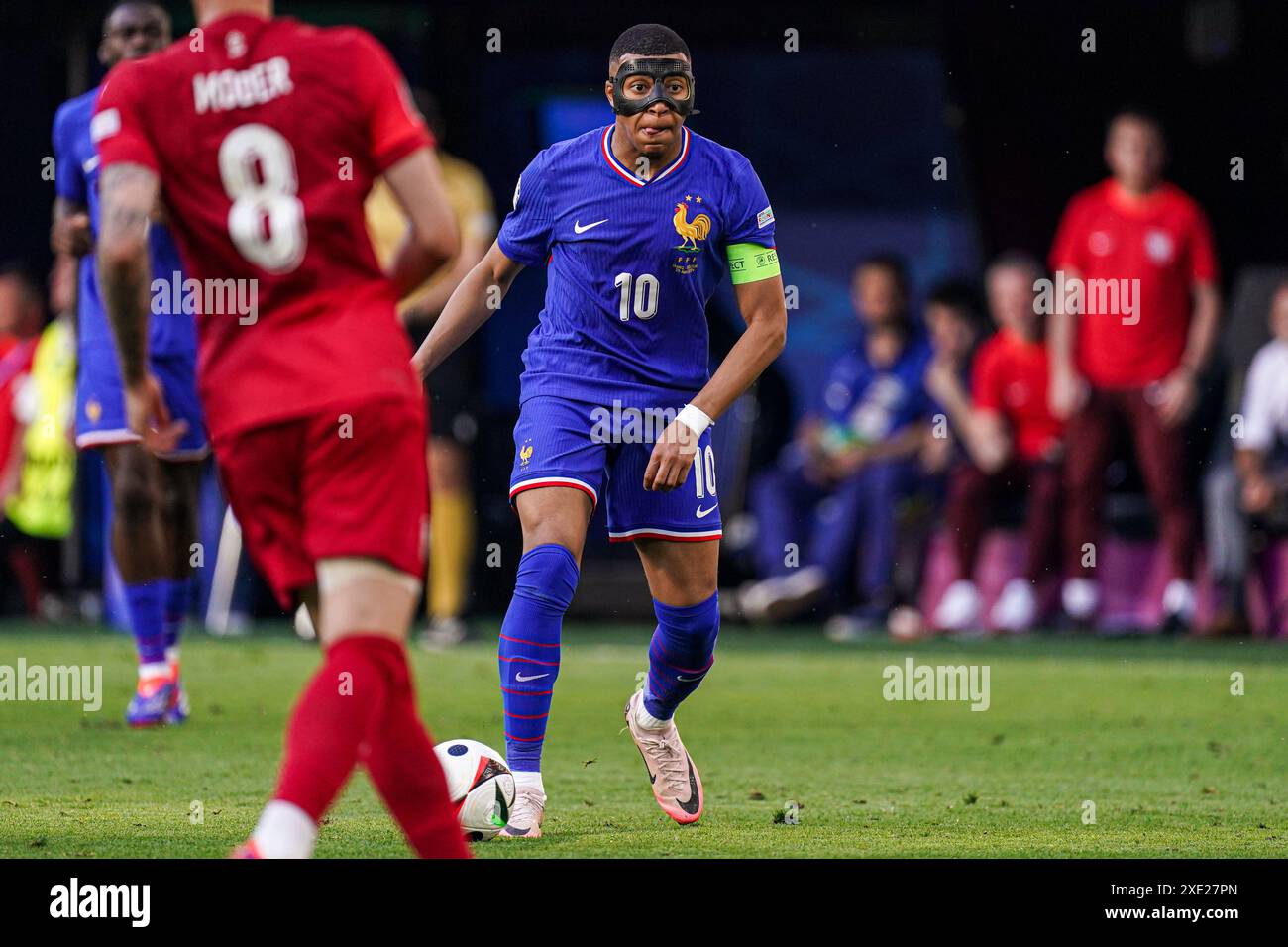 DORTMUND, GERMANY - JUNE 25: Kylian Mbappe of France with mask dribbles ...