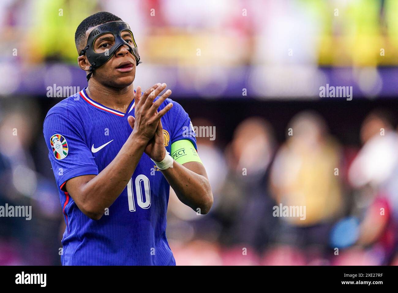 DORTMUND, GERMANY - JUNE 25: Kylian Mbappe of France with mask thanks ...