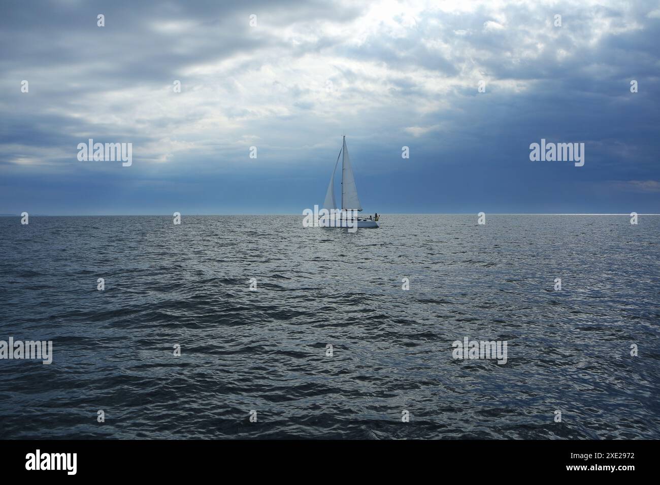 Sailing yacht alone on the high seas Stock Photo - Alamy