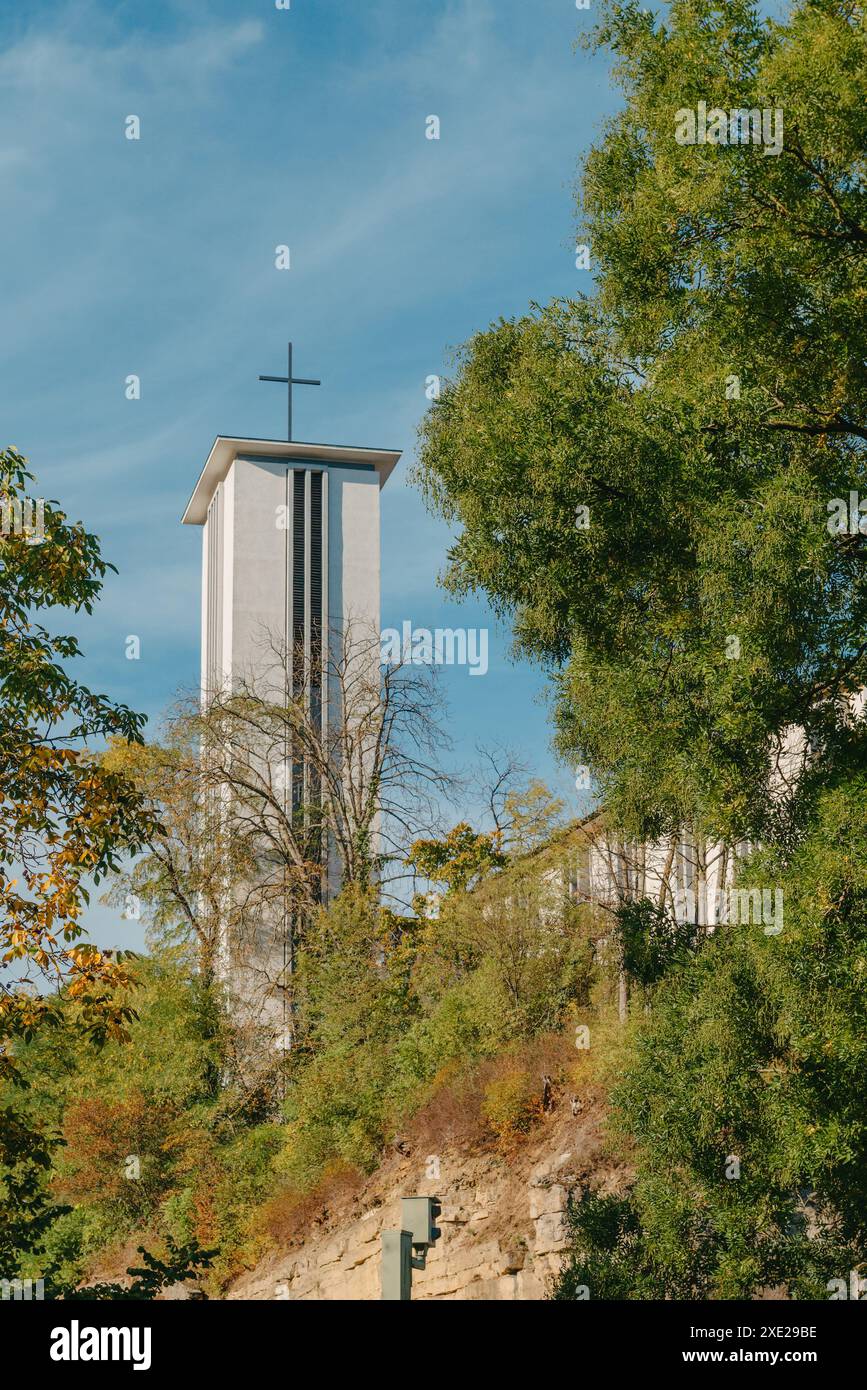Modern Church Tower with Big Metal Cross. Shot of a modern bell of a ...
