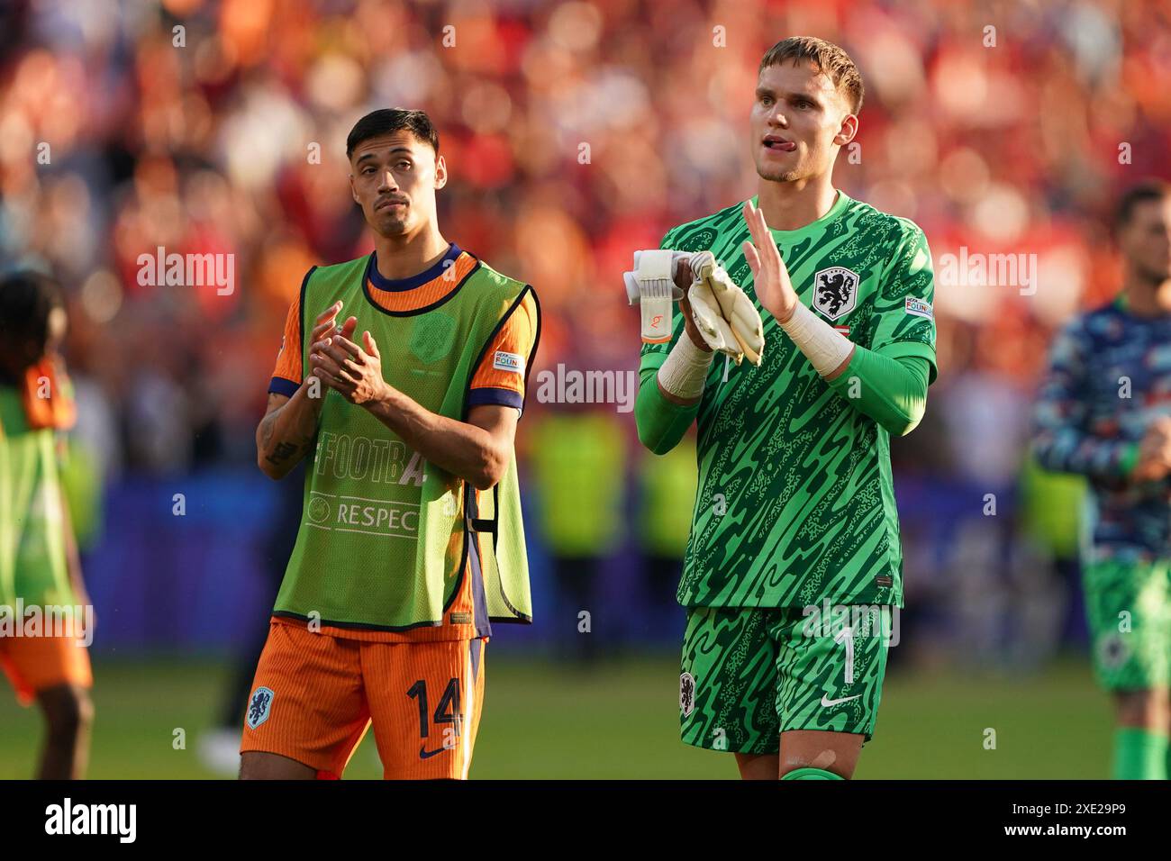 BERLIN, GERMANY - JUNE 25: Tijani Reijnders of Netherlands, goalkeeper Bart Verbruggen of ...