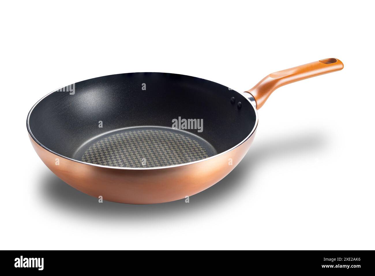 High angle view of stainless steel frying pan with wooden handle ...