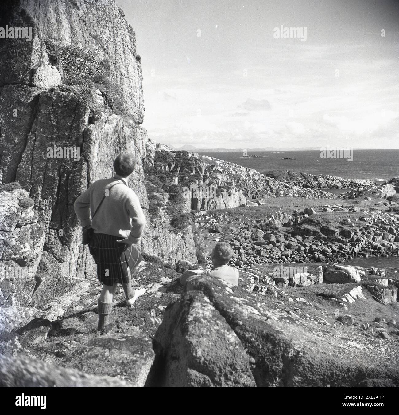 1950s, historical, man in a kilt looking for golden eagle chicks ...