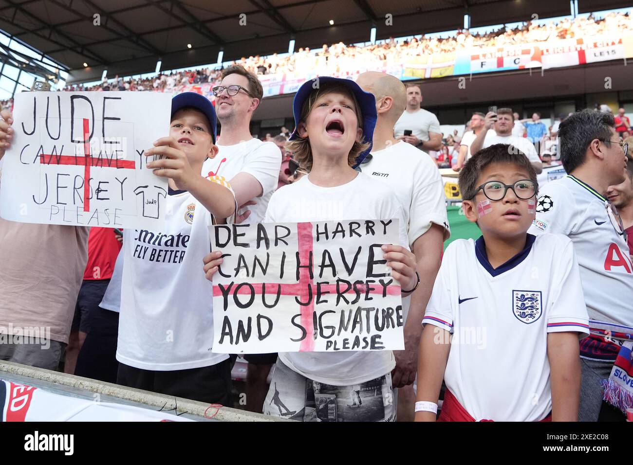 England fans hold up signs in the stands ahead of the UEFA Euro 2024 ...
