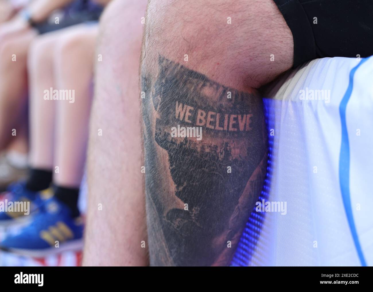 Cologne, Germany. 25th June, 2024. England fans leg tattoos during the ...