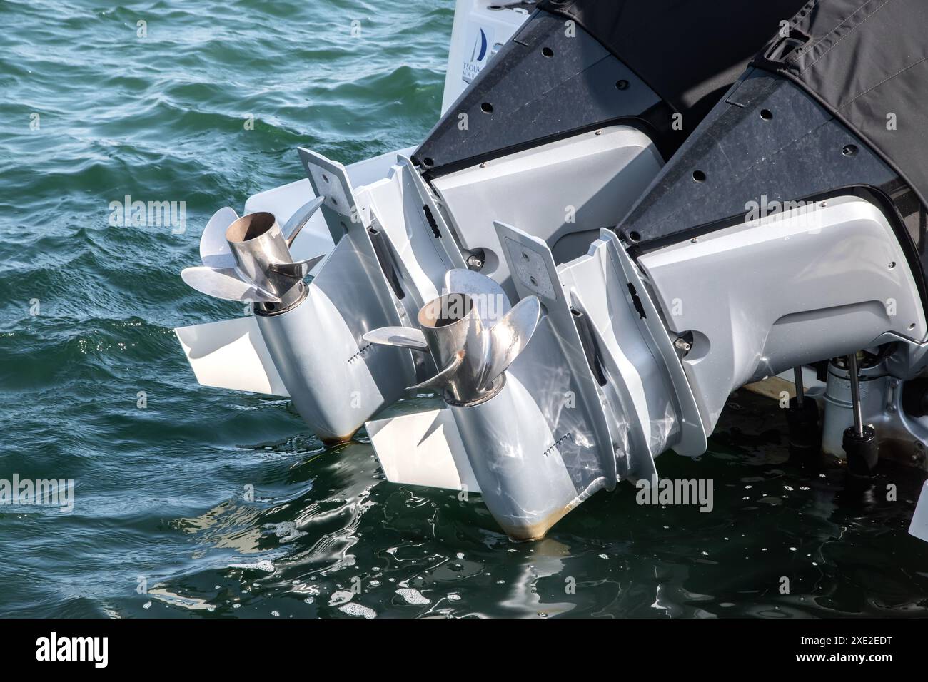 Outboard engine propeller on motorboat closeup on sea waters background ...