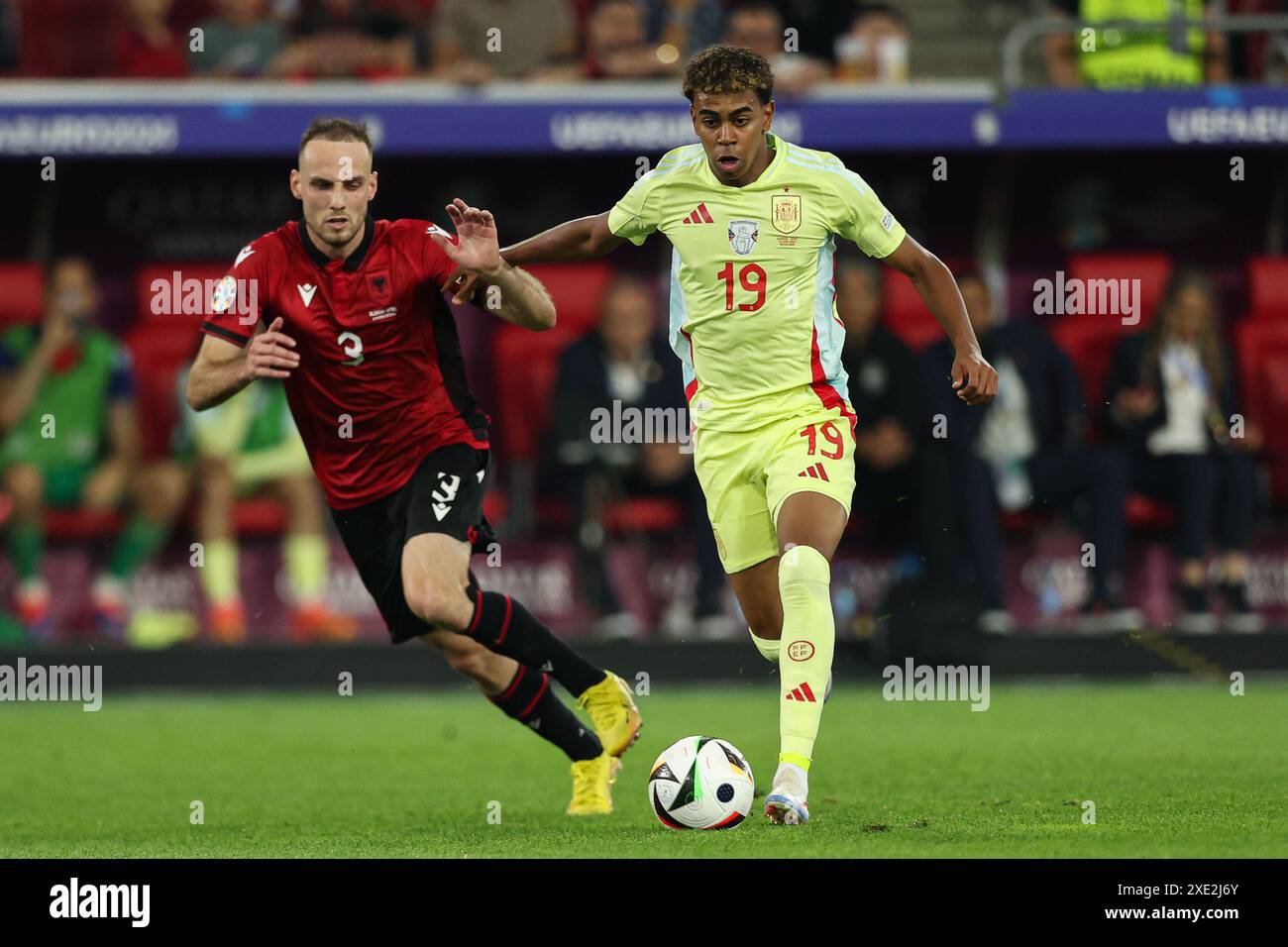 Mario Mitaj of Albania (L) and Lamine Yamal of Spain (R) seen in action ...