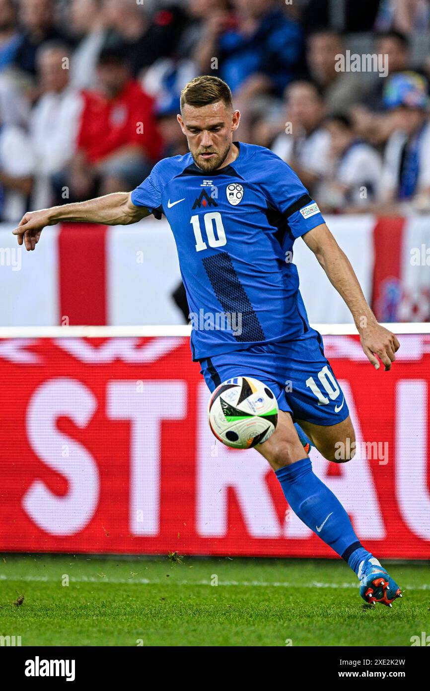 COLOGNE, GERMANY - JUNE 25: Timi Elsnik of Slovenia tries to shoot ...