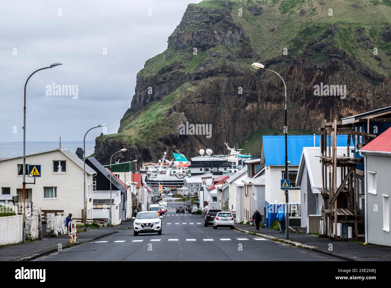 The city of Heimaey and the haven are located at the foot of the ...