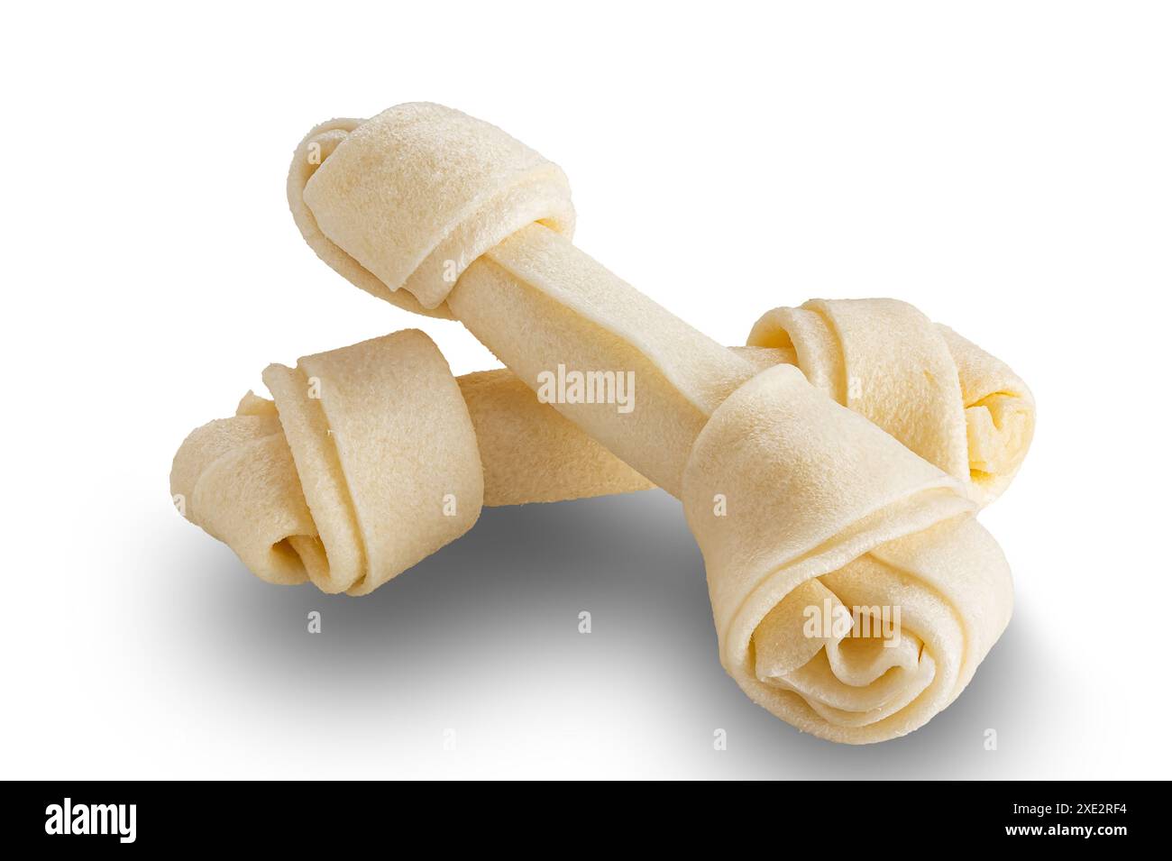 High angle view of two artificial bones for dog isolated on white ...