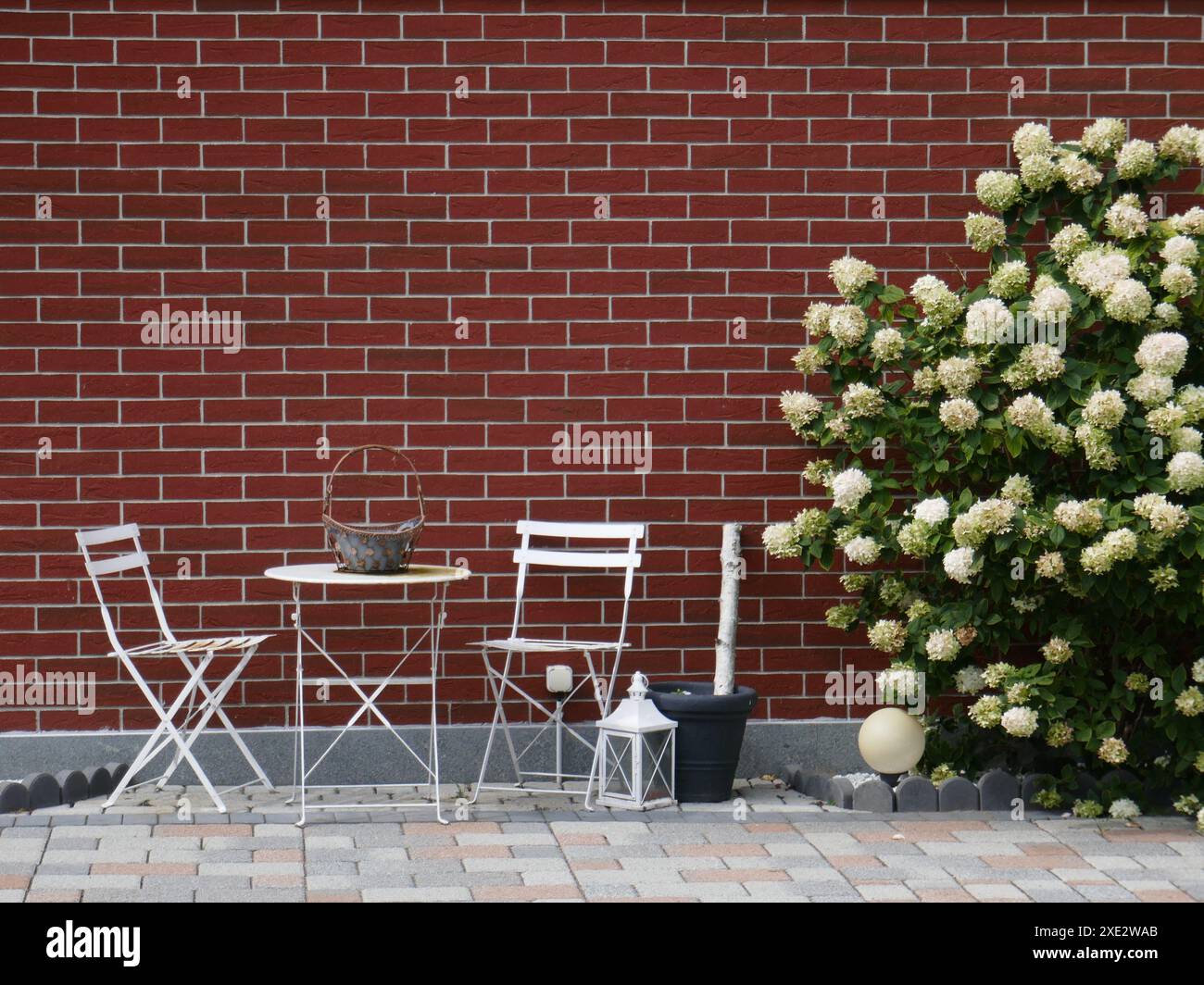 Terrace on a brick wall Stock Photo - Alamy
