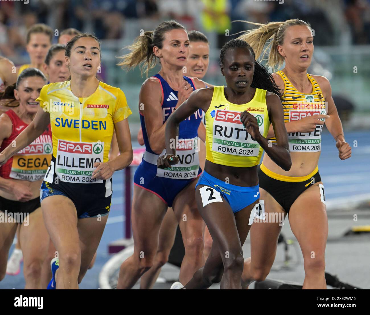 Stella Rutto of Romania and Lea Meyer of Germany competing in the women ...