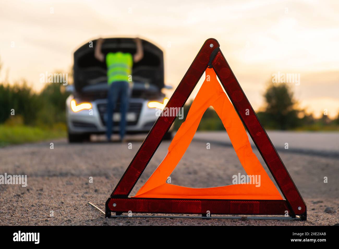 Car standing near stop sign hi-res stock photography and images - Alamy