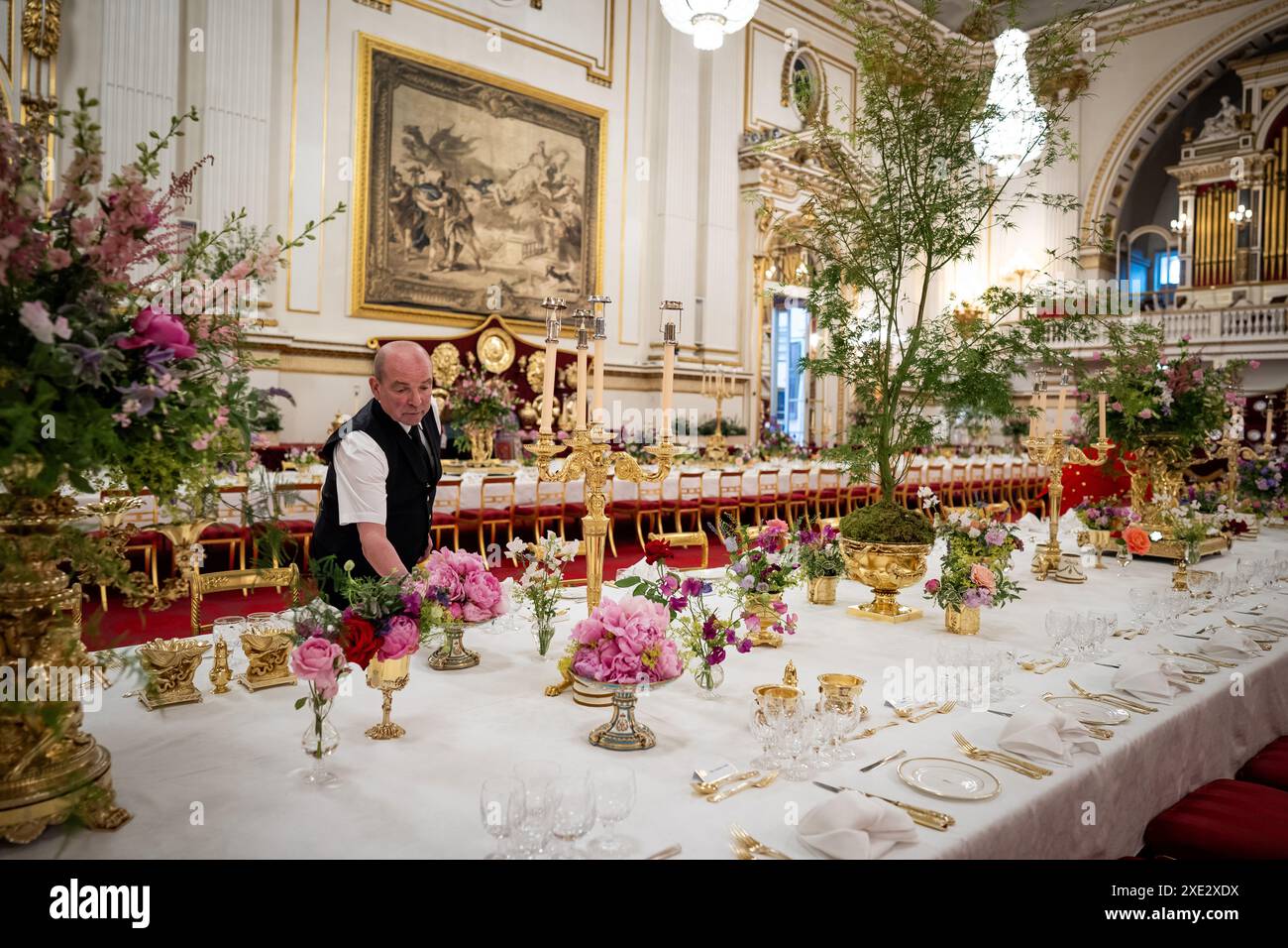 The finishing touches are applied to the tables in the Ballroom of ...