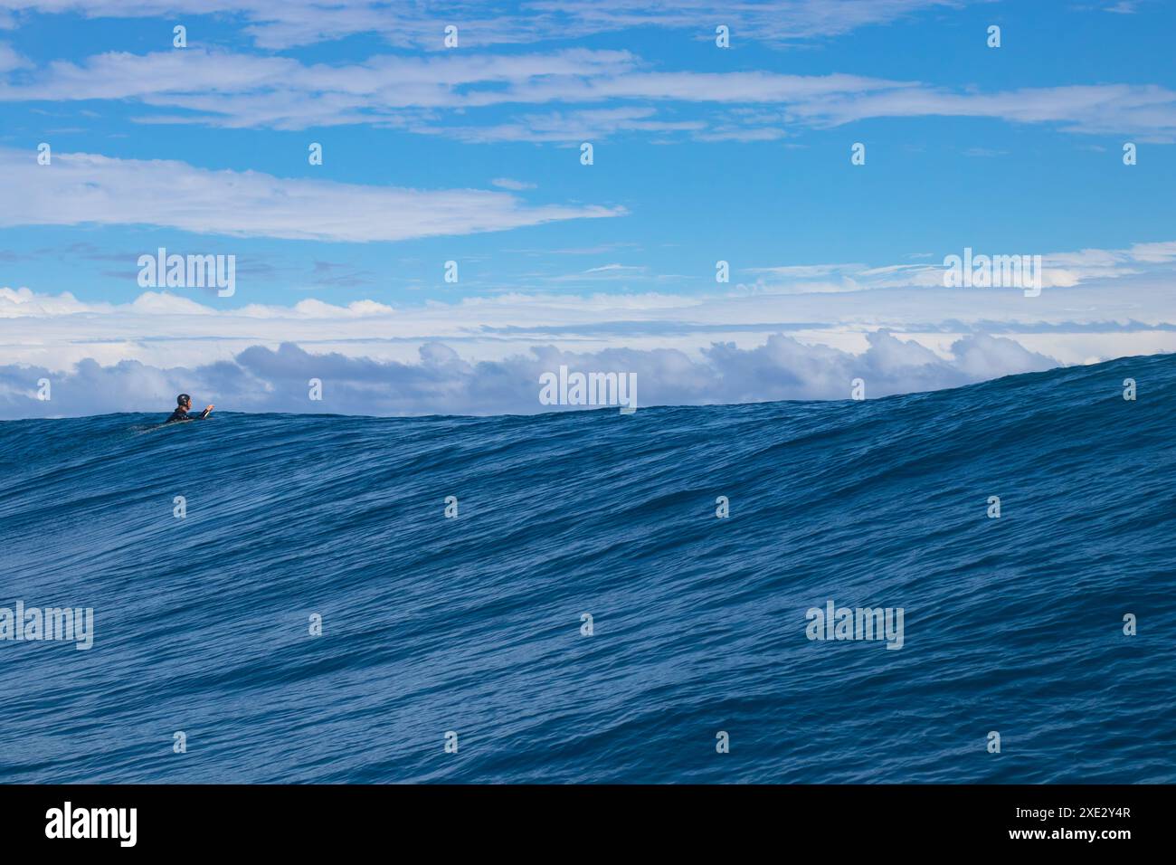 Teahupoo, Tahiti, French Polynesia - June 7, 2024 a lone surfer ...