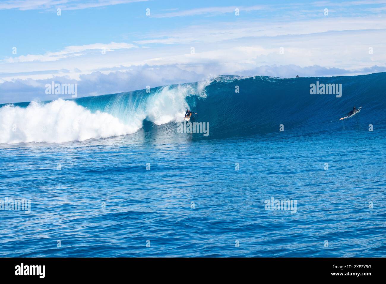 Teahupoo, Tahiti, French Polynesia - June 7, 2024 - surfers tackling a ...