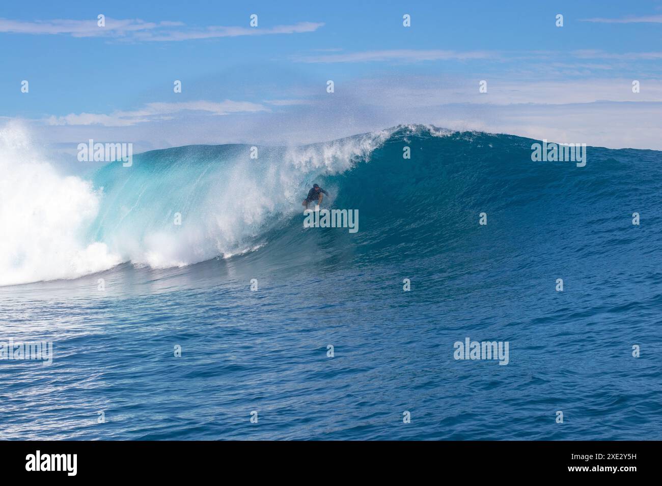 Teahupoo, Tahiti, French Polynesia - June 7, 2024 - a surfer tackling a ...