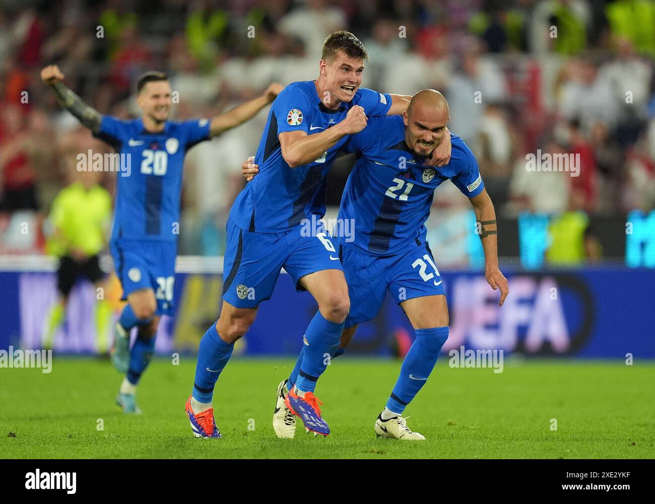 Slovenia's Jaka Bijol (centre) and Slovenia's Vanja Drkusic celebrate ...