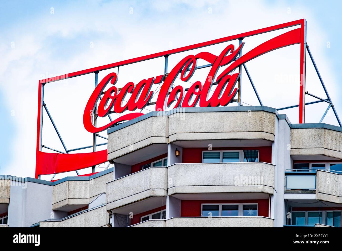 pop culture icon Coca-Cola logo atop high-rise building showcases global reach of the beverage ...