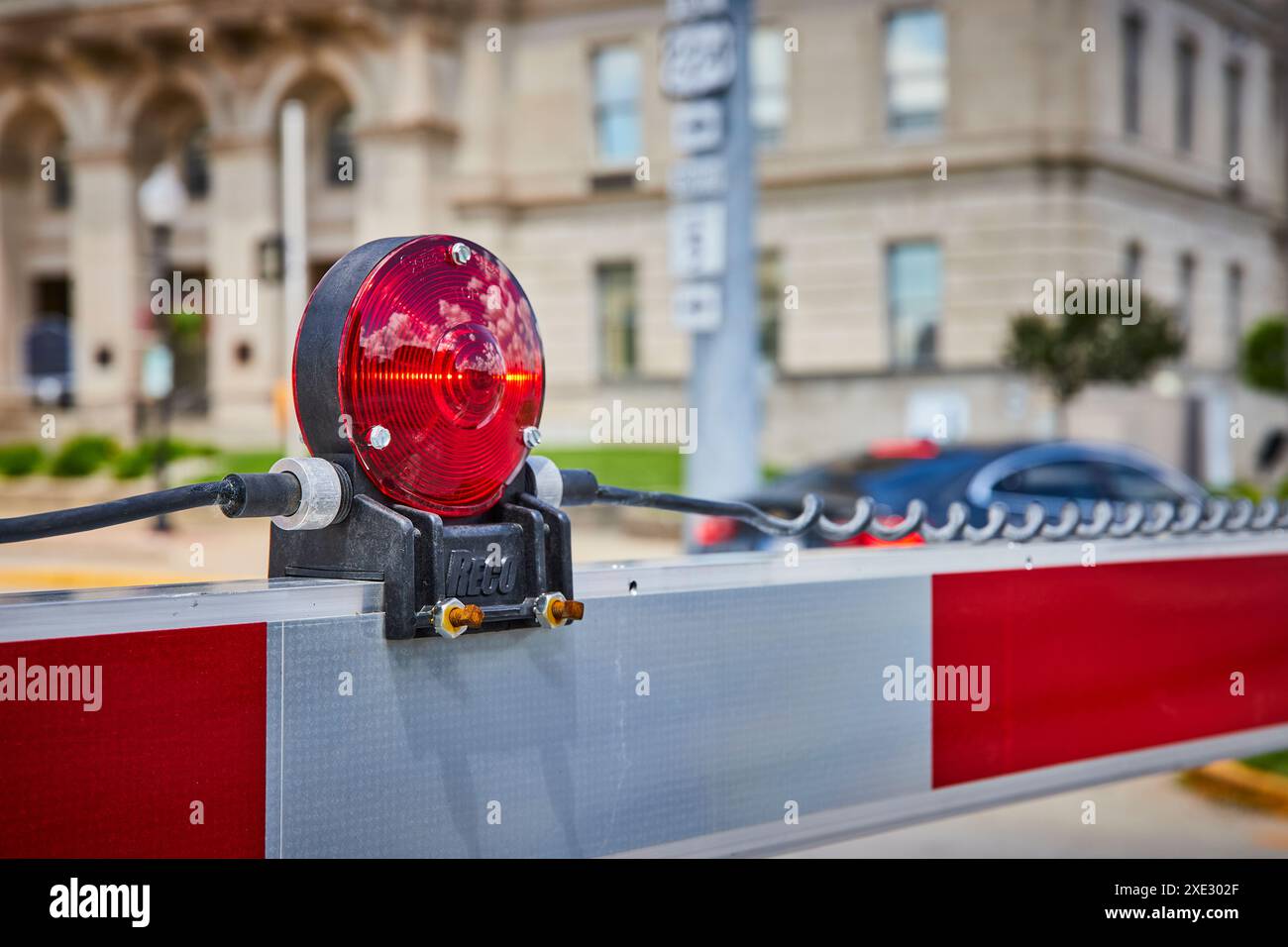 Red Warning Light and Security Barrier at Courthouse Entrance Eye-Level ...