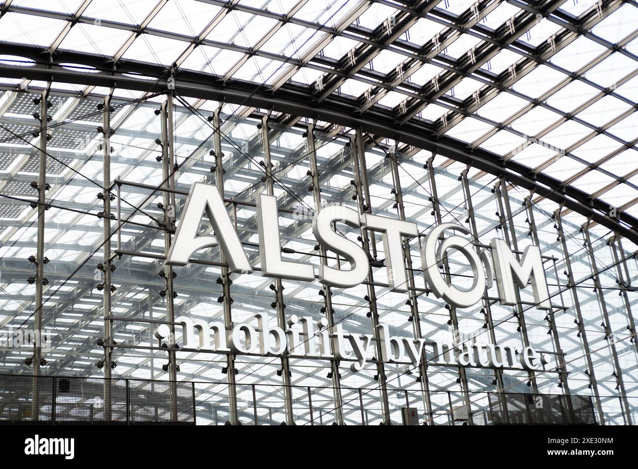 Alstom logo Company on arched metal vault at train station, French ...