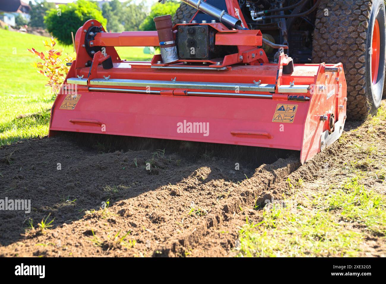 Soil cultivation with a tiller and small tractor - garden landscaping ...