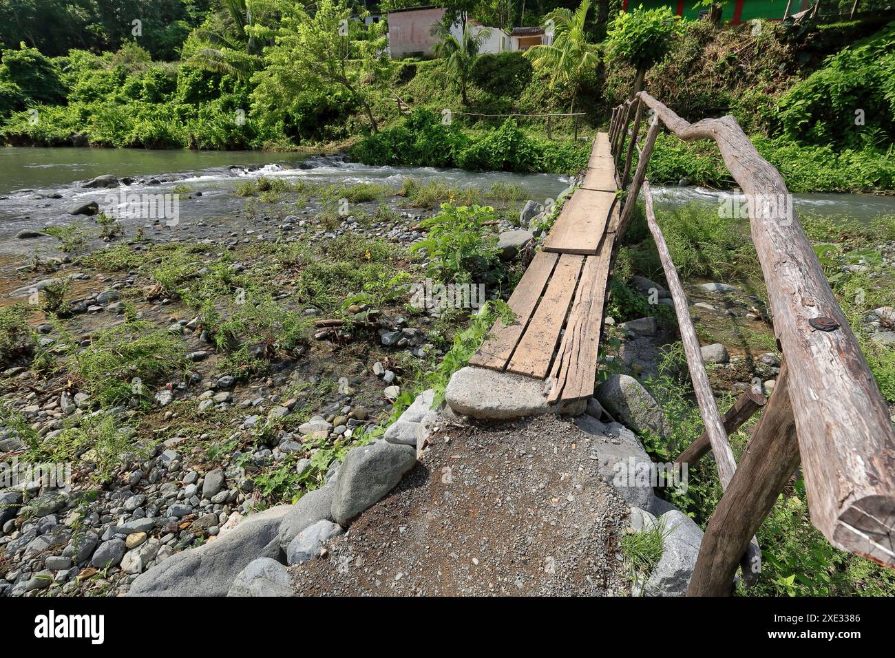 425 Wood railing and plank deck, timber bridge across the Rio Yara ...