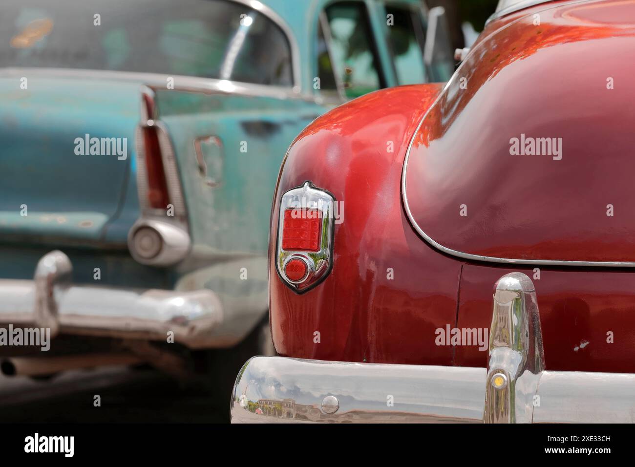 439 Classic 4 door sedan cars -red 1952 Chevrolet, green 1956 Dodge- at ...