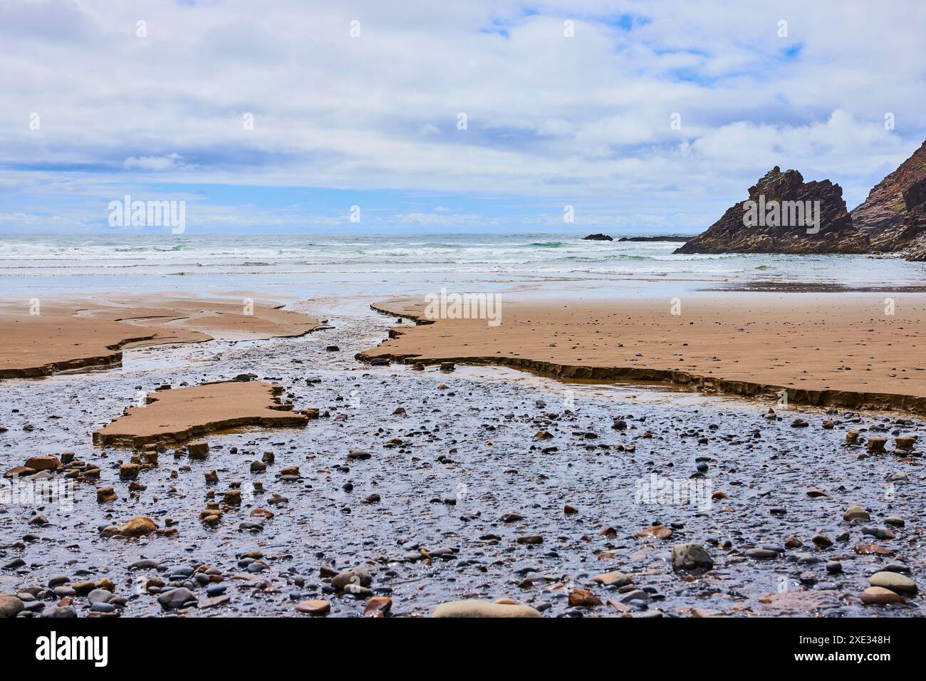 Rocky Shoreline and Cliff with Calm Ocean Low Perspective Stock Photo ...