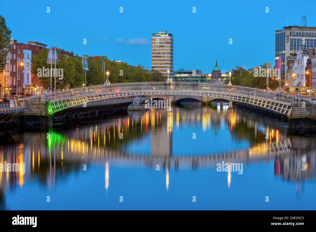 The river Liffey and the famous Ha'penny Bridge in Dublin, Ireland, at ...