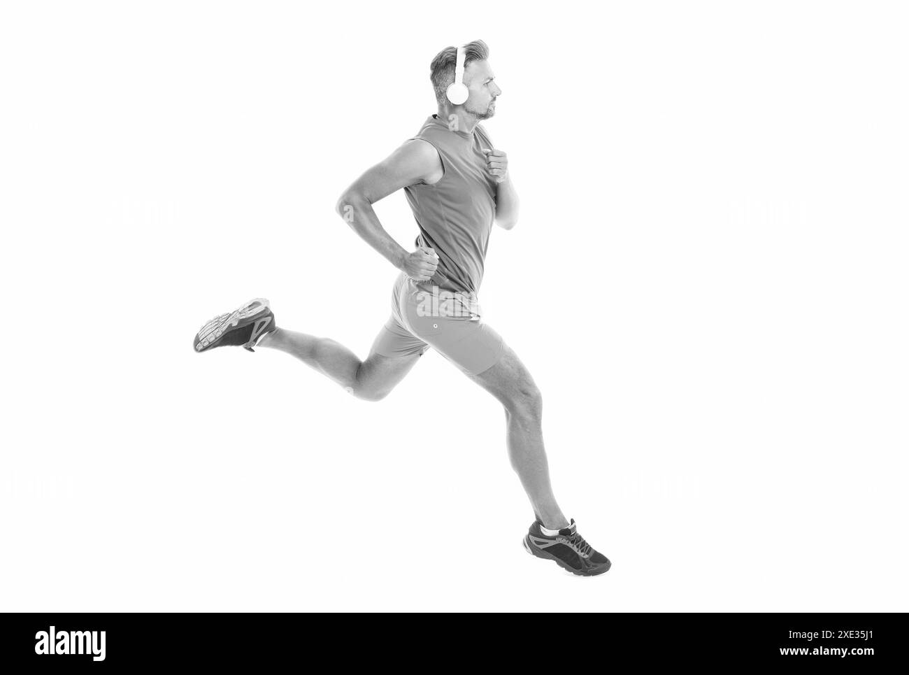 sport runner crossing the finish line after completing a marathon ...