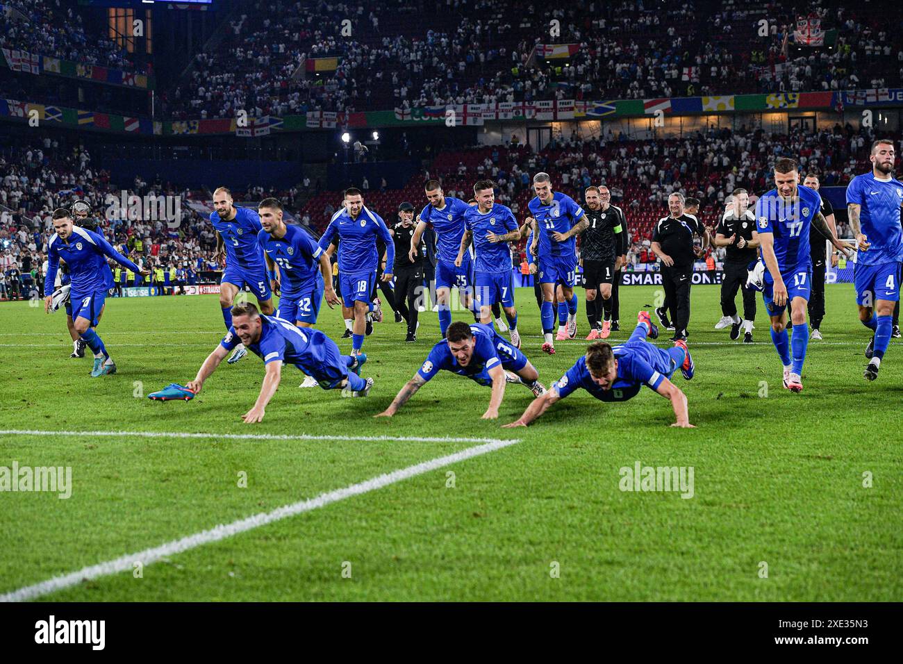 COLOGNE, GERMANY - JUNE 25: players of Slovenia celebrate the win ...