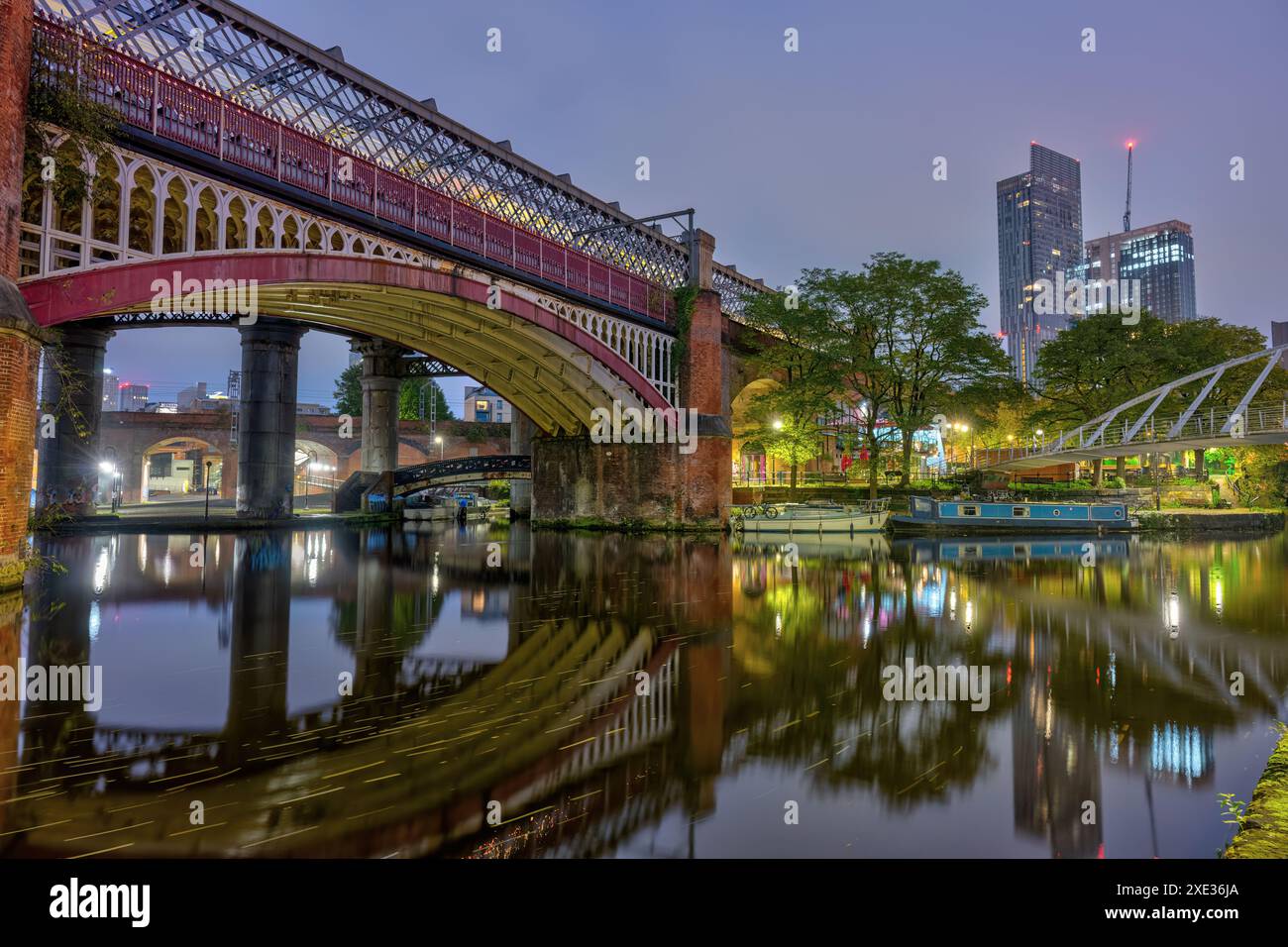 The famous Castlefield Viaduct in Manchester, UK, at night Stock Photo ...
