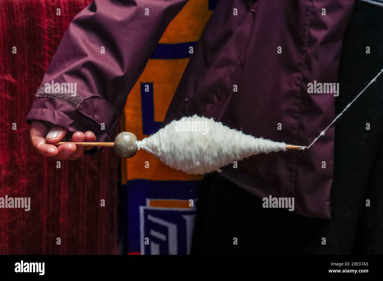 Native woman knitting colorful yarn hi-res stock photography and images ...