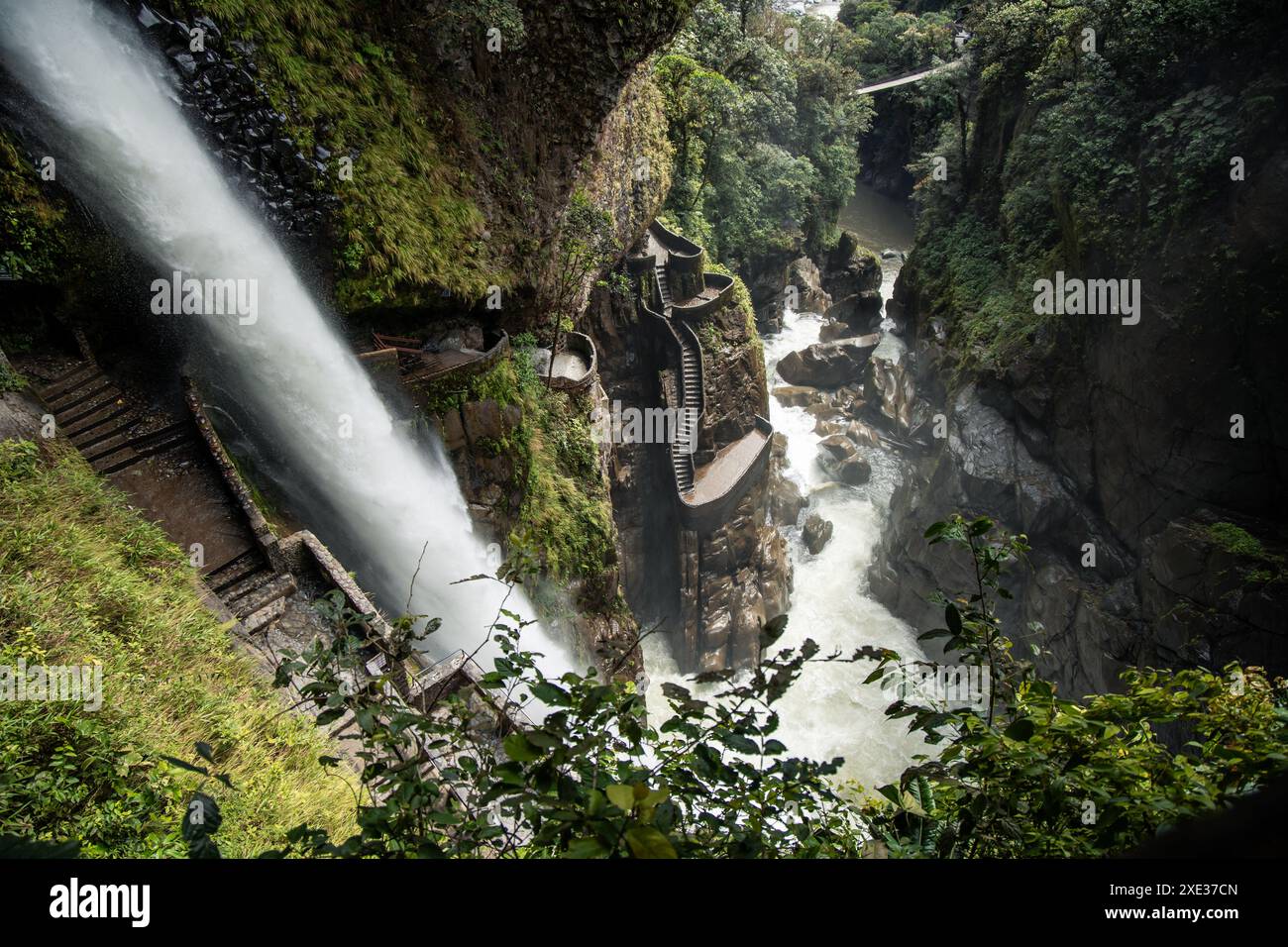 panoramic view of the Pailon del Diablo waterfall and its iconic stairs ...