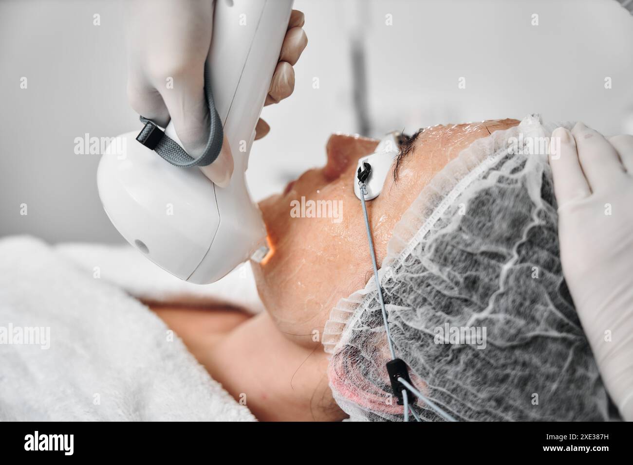 A woman receives IPL therapy in a beauty salon Stock Photo - Alamy